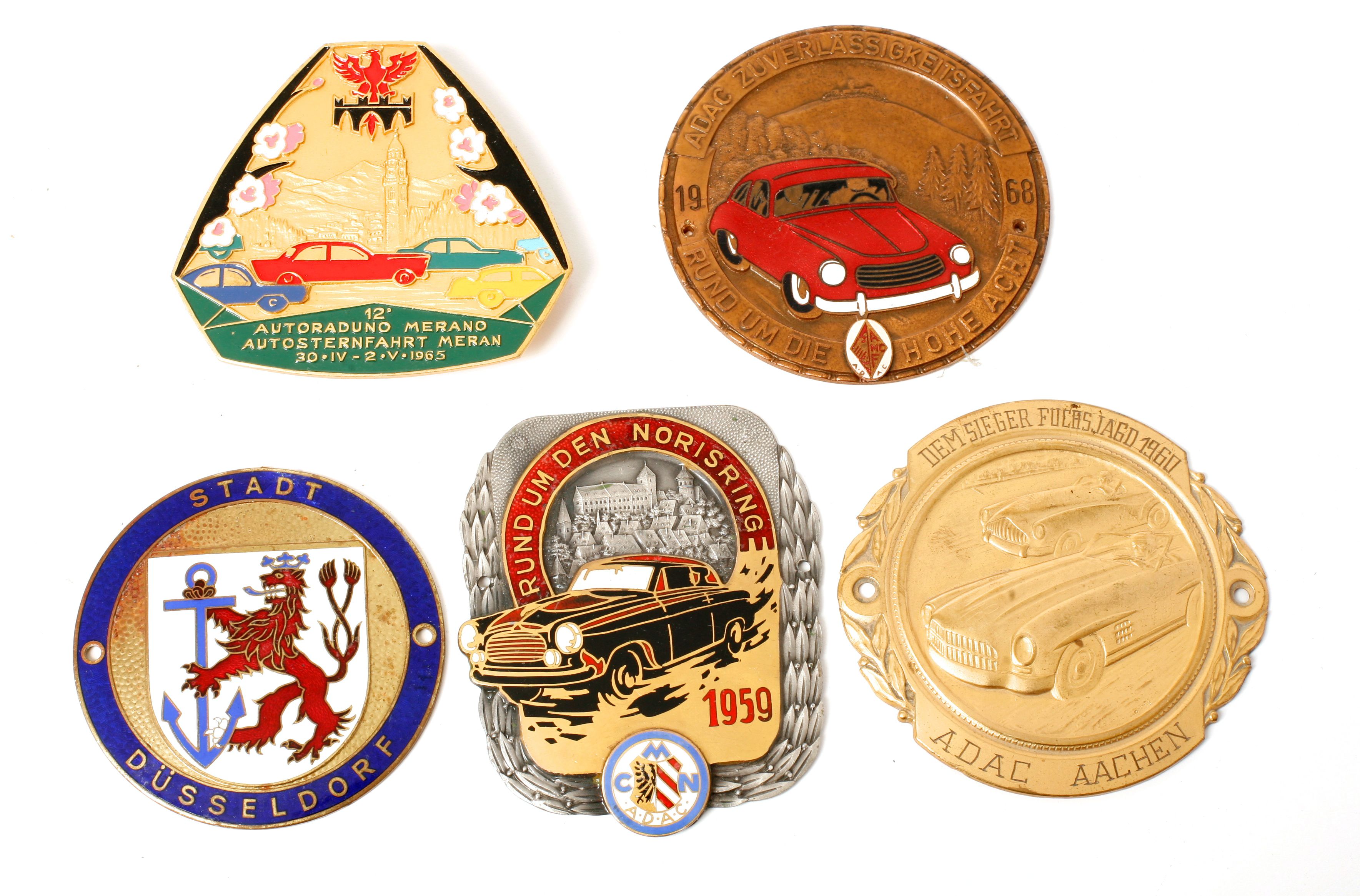 Bonhams Cars : A lot of five German postwar Rallye badges.