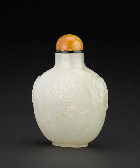Bonhams : A finely carved white jade snuff bottle 1780-1860