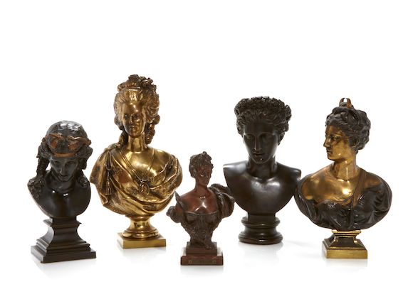Bonhams : A group of five patinated metal busts of women