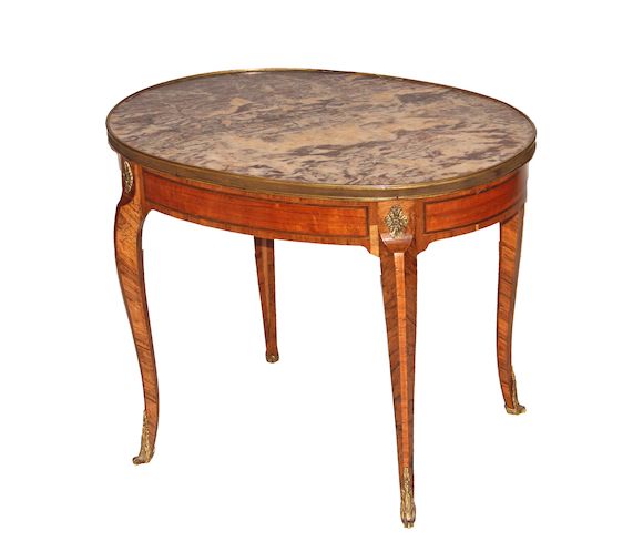 Bonhams : A Rococo style beechwood marble inset oval low table