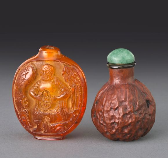 Bonhams : An amber snuff bottle with a walnut snuff bottle