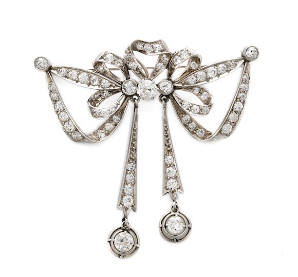 Bonhams : A diamond articulated bow brooch