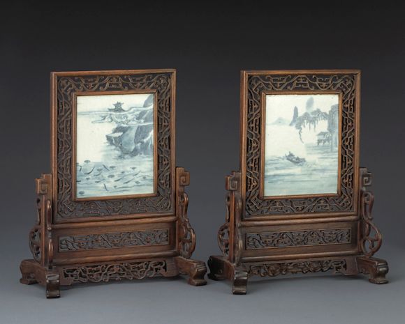 Bonhams : A pair of small pieced wood table screens inset with blue and ...