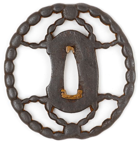 Bonhams : A rare Haguro school tsuba Edo period (17th century)
