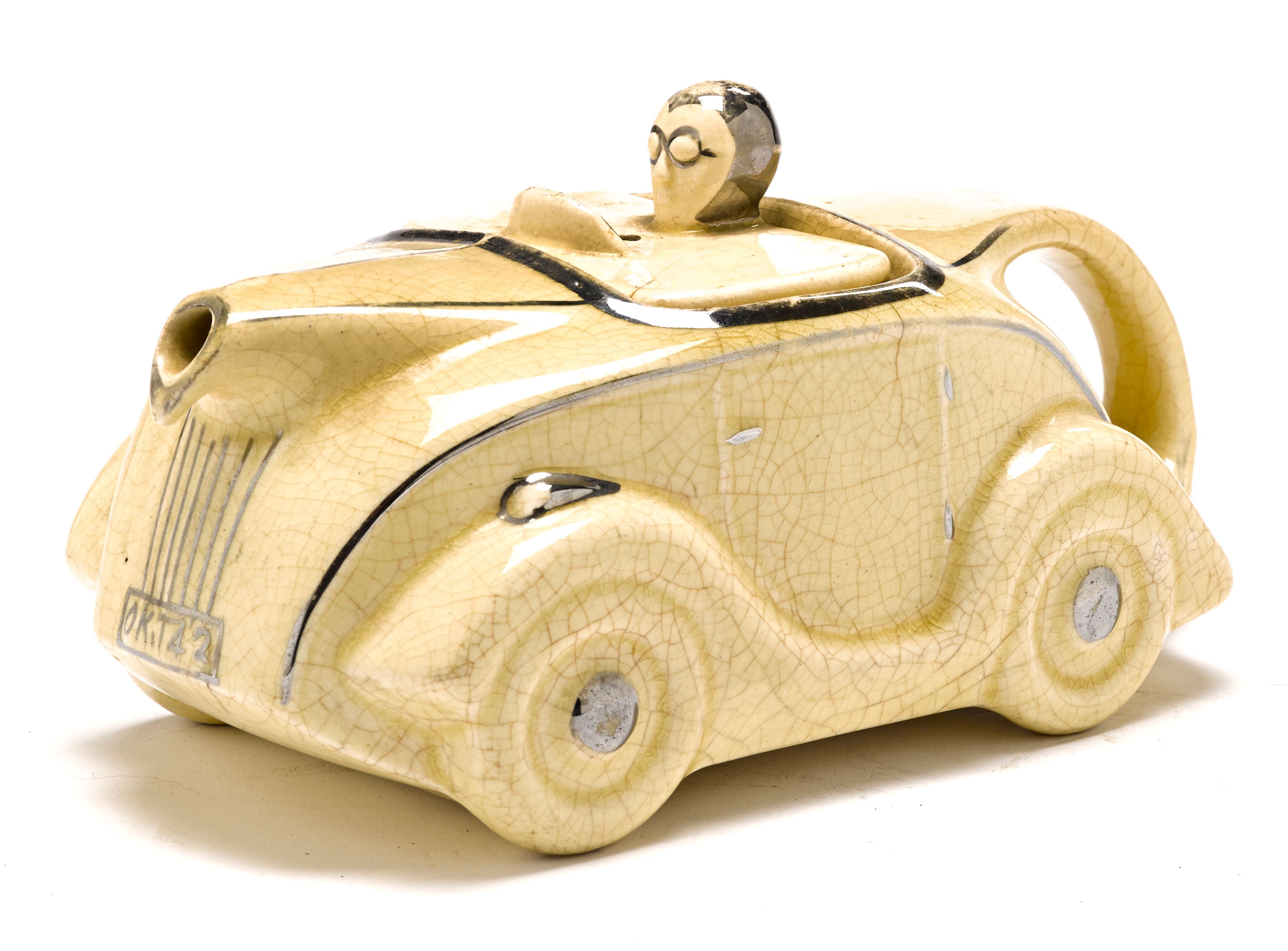 Bonhams Cars : A ceramic race car tea pot,