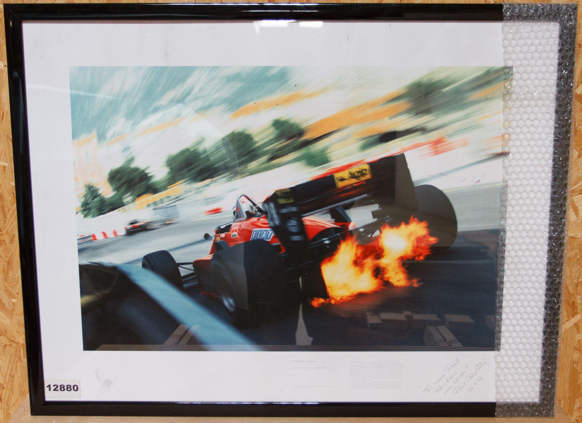 Bonhams Cars : A limited edition print of a Ferrari F1 car rounding a ...
