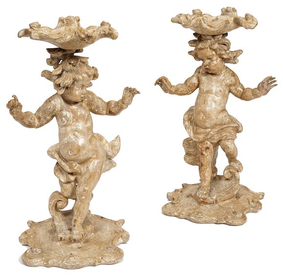 Bonhams : A pair of Italian Rococo style carved figural stands of ...