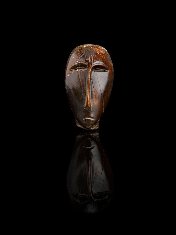 Bonhams : A magnificent and important Okvik Eskimo ivory head