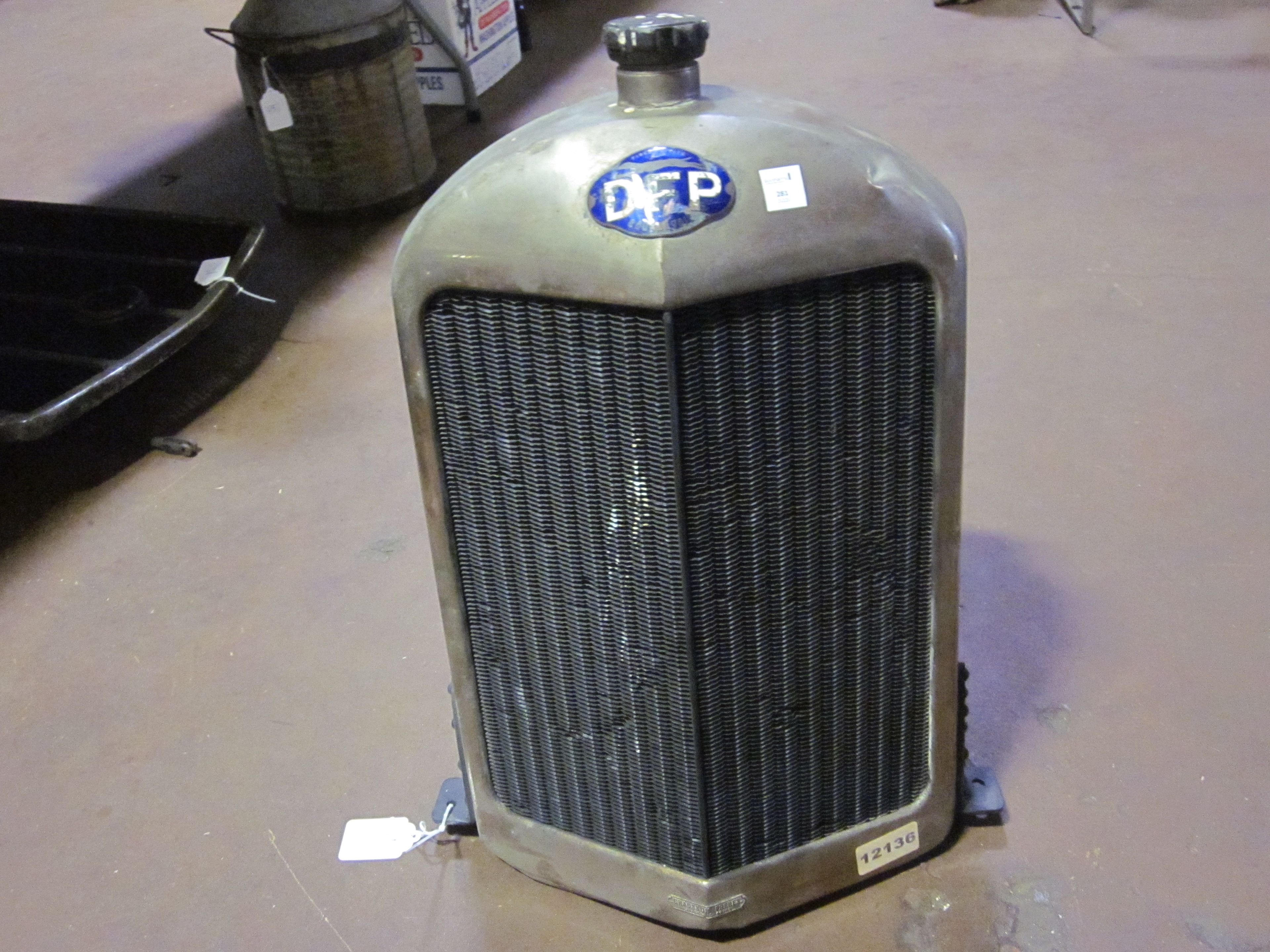 Bonhams Cars : A small V radiator,