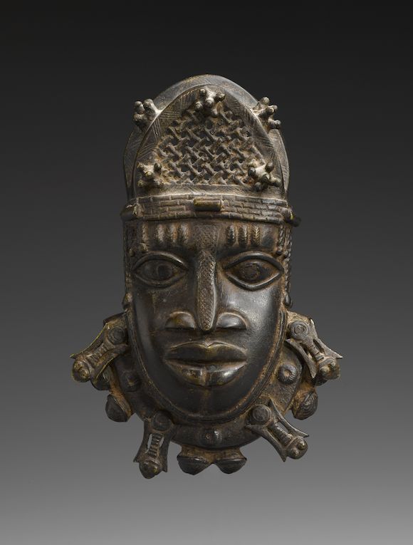 Bonhams : Benin Mask Hip Ornament, Nigeria