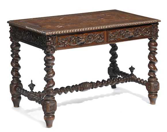 Bonhams : A Continental Baroque style carved mixed wood writing desk ...