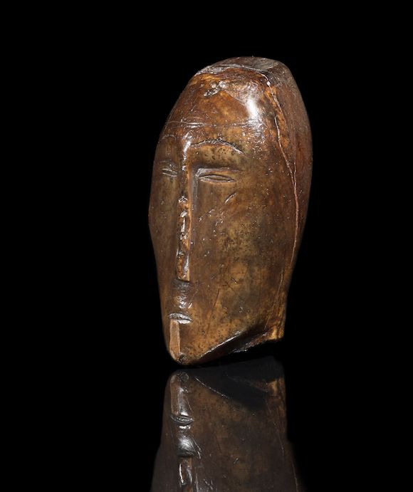 Bonhams : A rare and important Okvik Eskimo ivory head