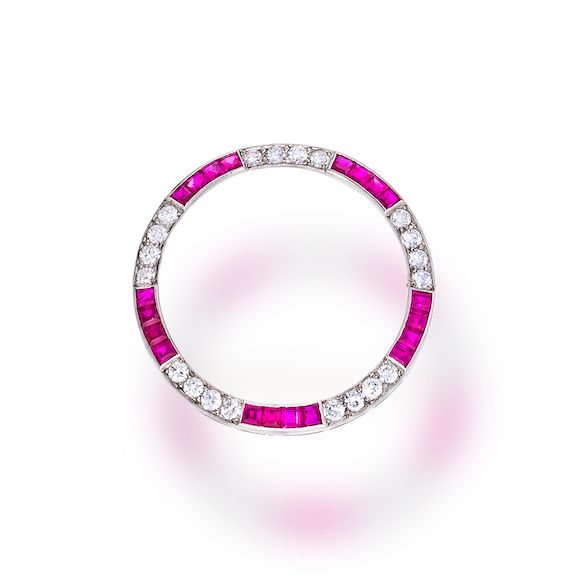 Bonhams : A ruby and diamond circle brooch, Raymond Yard