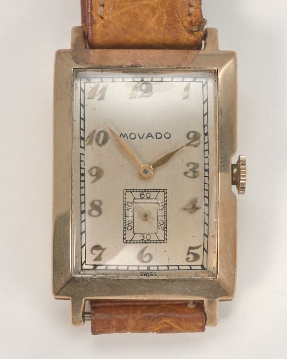Bonhams : A 14k gold curved rectangular wristwatch, Movado, with later ...