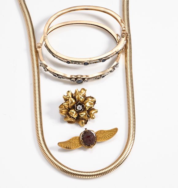 Bonhams : A 14k gold flattened snake chain, Forstner, together with a ...