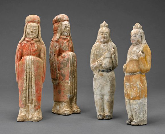 Bonhams : A group of four painted gray pottery funerary figures ...