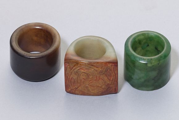 Bonhams : A group of three jade archer's rings