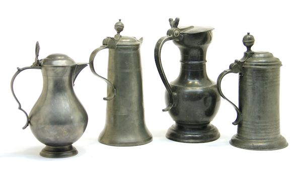 Bonhams : Four European pewter flagons second half 18th century