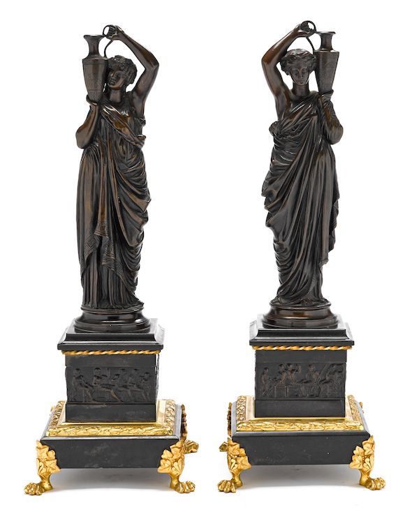 Bonhams : A pair of French Neo Greco patinated, gilt bronze and black ...