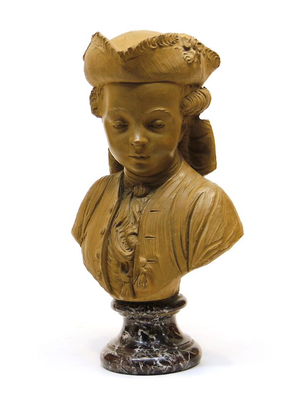 Bonhams : A French terracotta bust of a boy on variegated marble socle ...