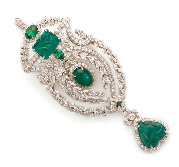 Bonhams : An emerald, tsavorite garnet and diamond pendant/brooch
