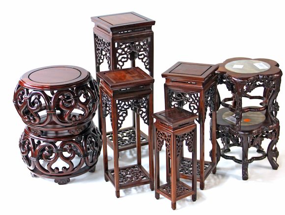 Bonhams : A group of small pieced wood display stands