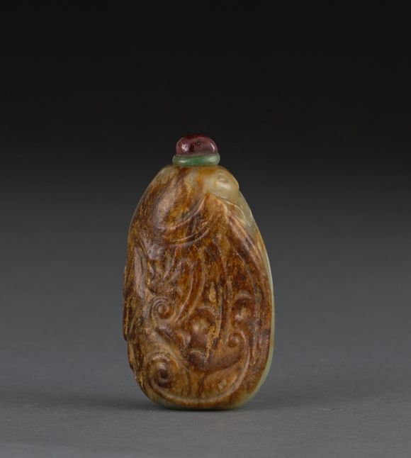 Bonhams : A carved jade bat form snuff bottle