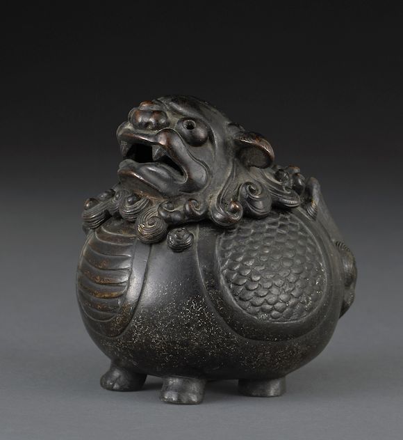 Bonhams : A two-part cast bronze mythical beast form censer 17th century