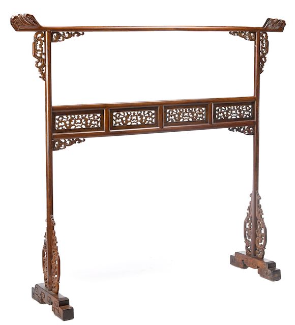 Bonhams : A large hardwood robe rack