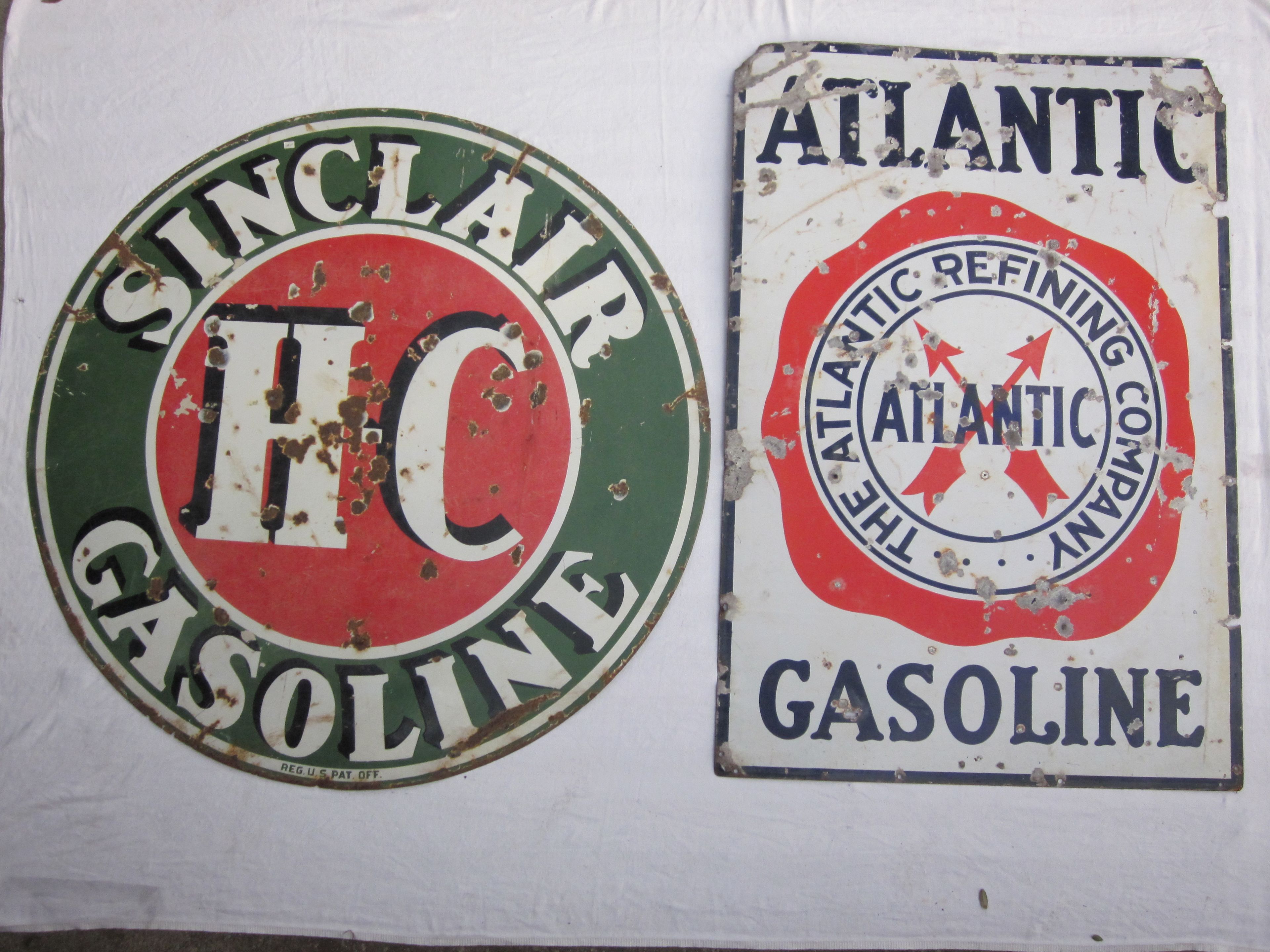 Bonhams Cars : A lot of two vintage advertising signs,