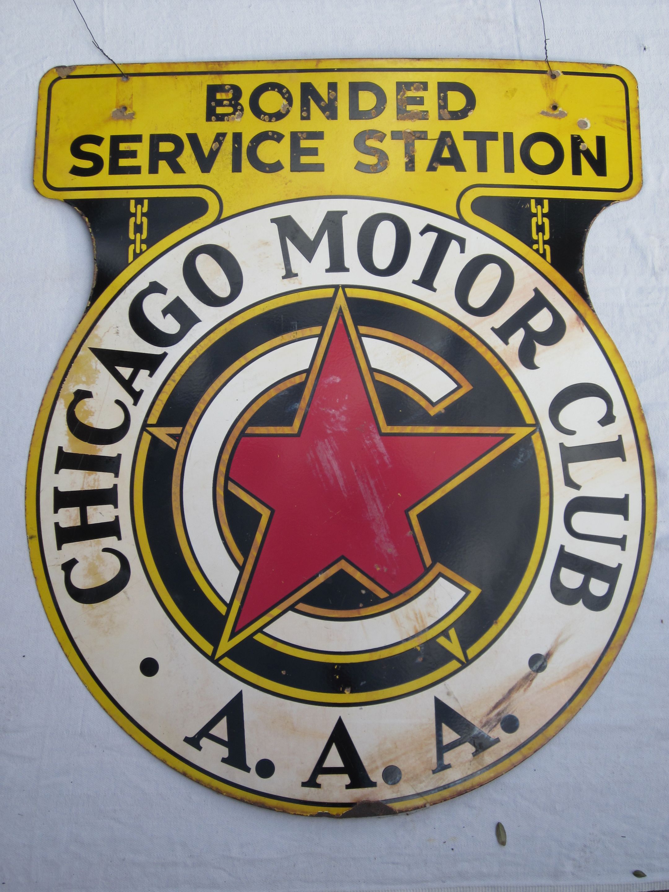 Bonhams Cars : A large double-sided, enameled Chicago Motor Club sign,