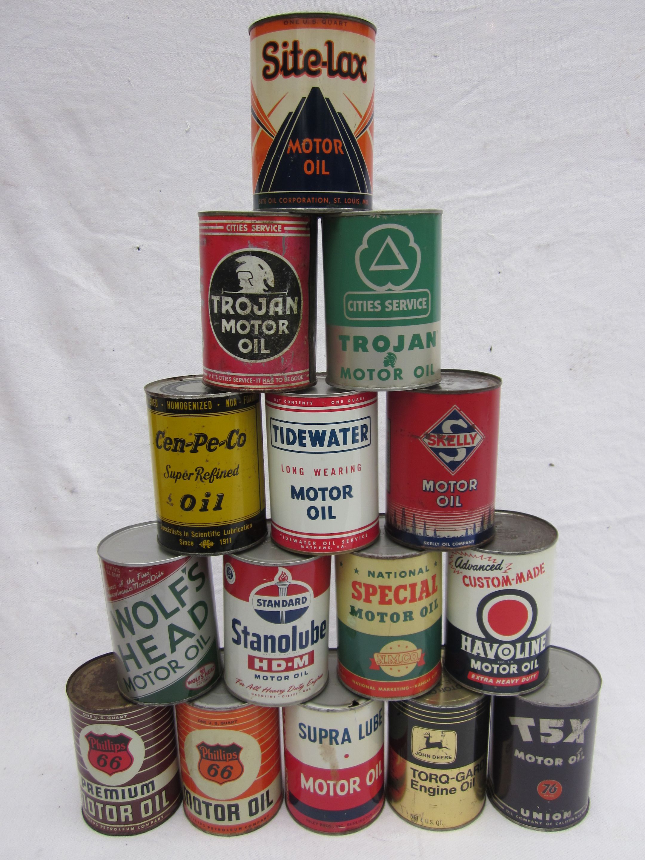 Bonhams Cars : A mixed grouping of collectible oil cans,