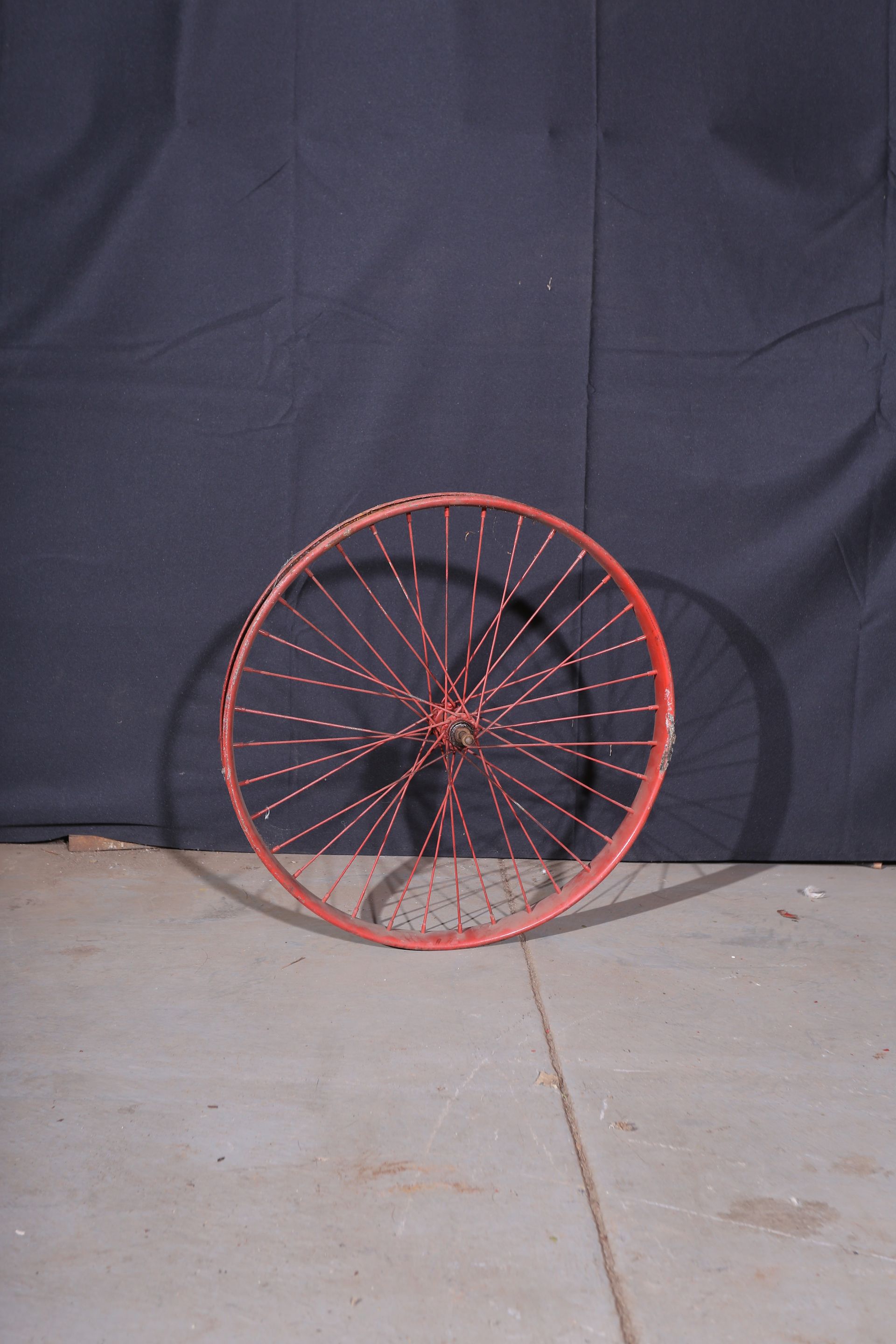 Bonhams Cars : A 22 ins. steel motorcycle wheel,