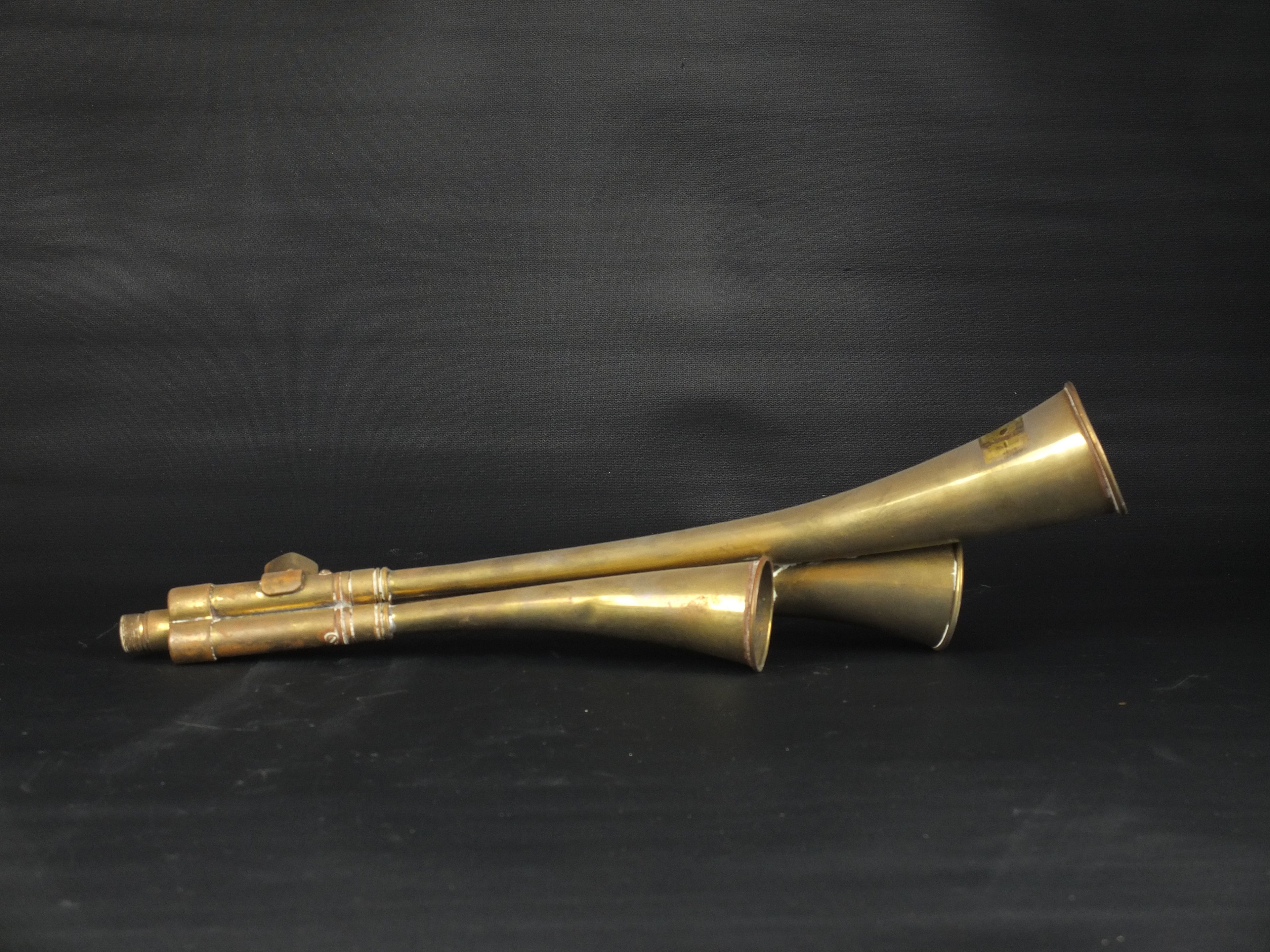 Bonhams Cars : A three-trumpet horn,