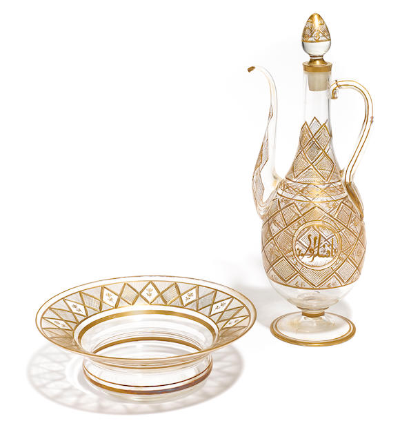 Bonhams A Bohemian Gilt Heightened Clear Glass Ewer With Stopper And