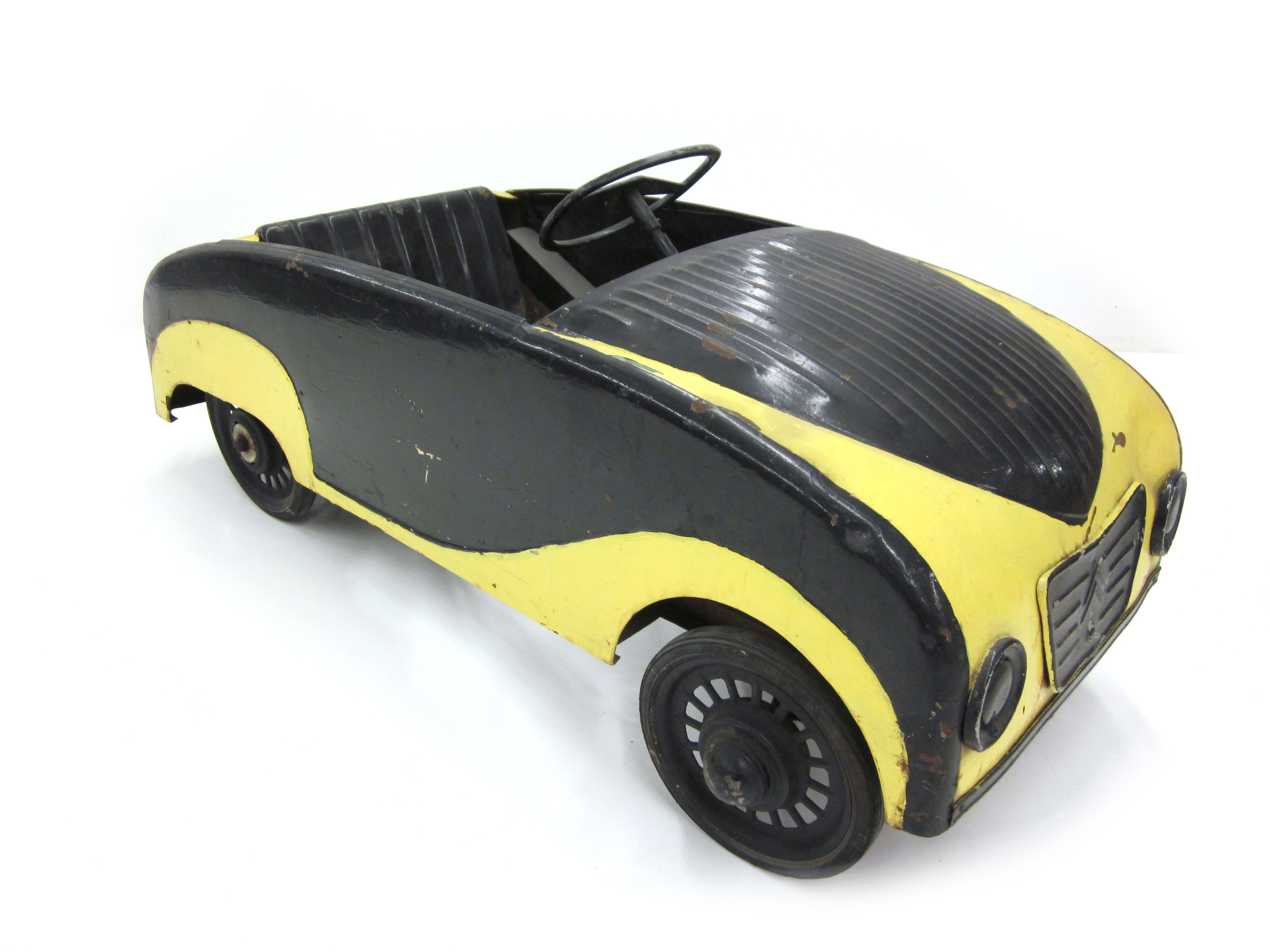 Bonhams Cars : A yellow/black Citroën pedal car, c. 1950s,