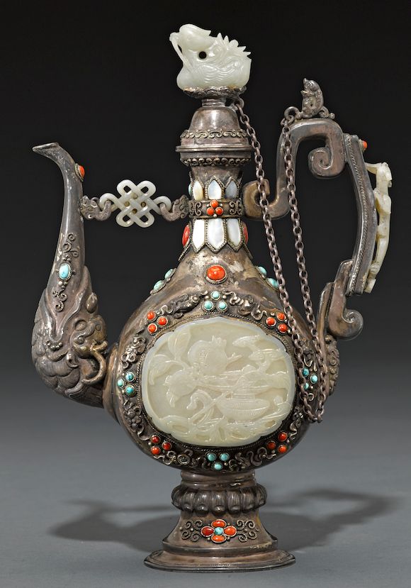 Bonhams : A Mongolian silver ewer with colored stone inlay