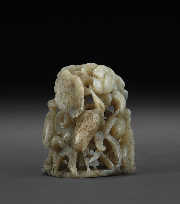 Bonhams : A reticulated jade hat finial Yuan dynasty