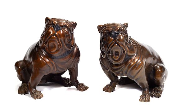 Bonhams : A pair of paint decorated models of bulldogs
