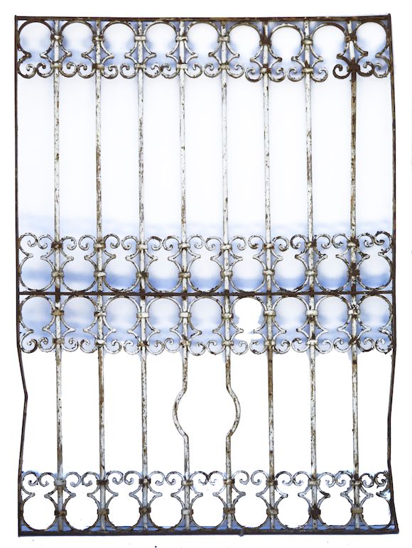 Bonhams : A set of seven wrought iron window guards
