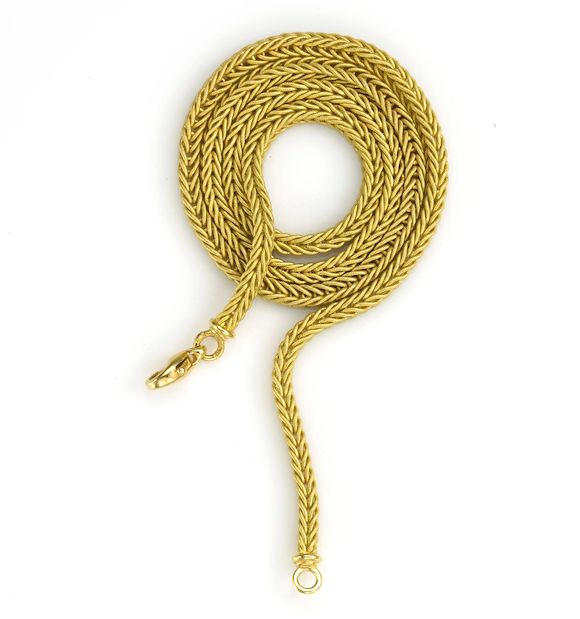 Bonhams : An 18k gold fox tail link necklace