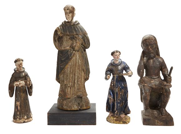 Bonhams : A group of four Spanish Colonial carved wood saints
