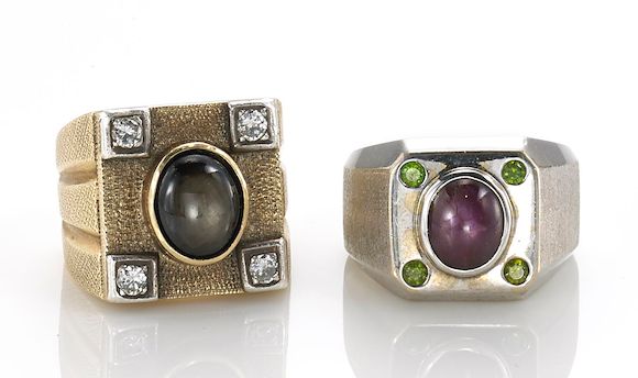 Bonhams : A star ruby, tsavorite garnet and 18k white gold ring together with a black star ...