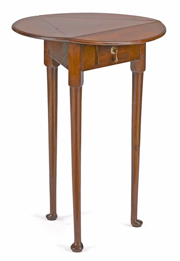 Bonhams : A Queen Anne style mahogany triangular drop leaf table