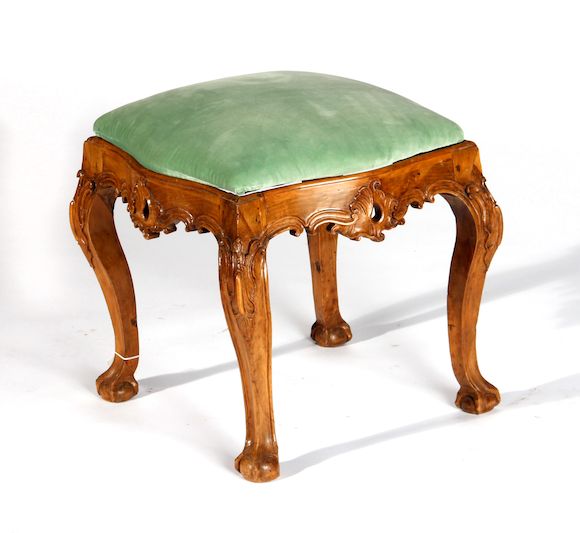 Bonhams : An Italian Rococo style walnut stool with inset velvet seat