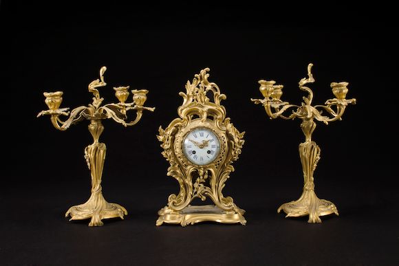 Bonhams : A Louis XV style gilt bronze three-piece clock garniture the ...