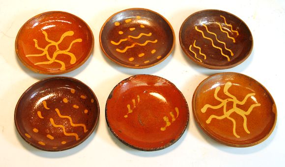 Bonhams : Six American or Continental slip decorated redware plates ...