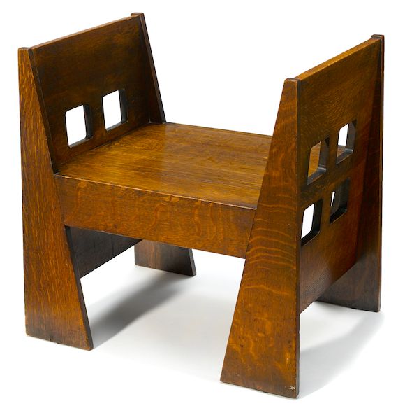 Bonhams : A Charles Limbert oak cut-out window seat model 243, circa 1908