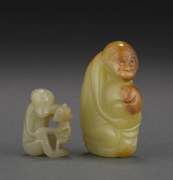 Bonhams : Two jade monkey carvings