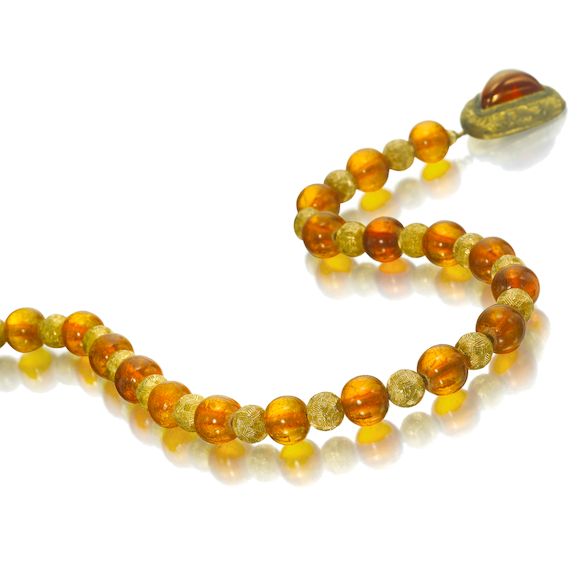 Bonhams : An amber, garnet and eighteen karat gold and metal necklace ...